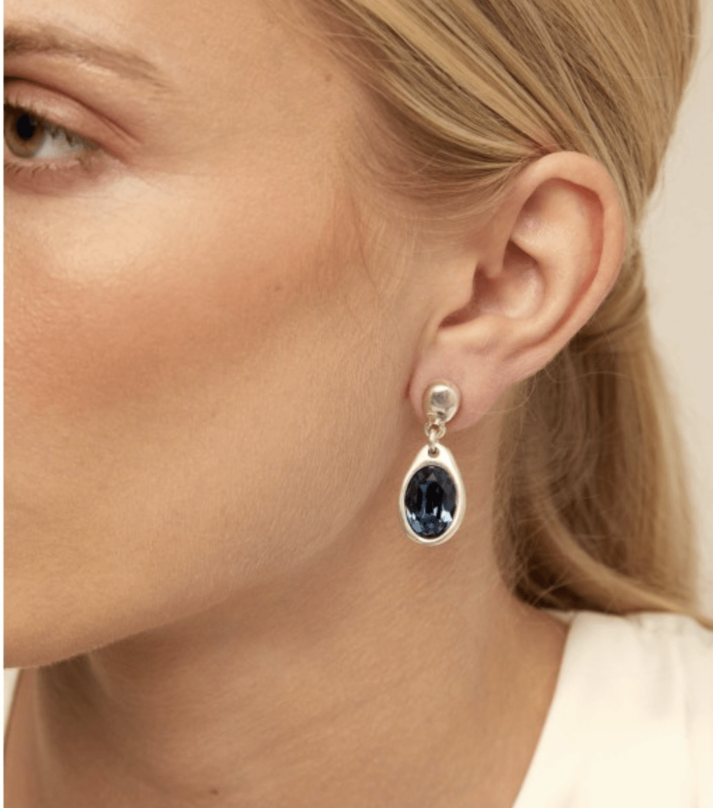 Aros Uno de 50 Destello plateados colgantes con piedra redonde azul ...