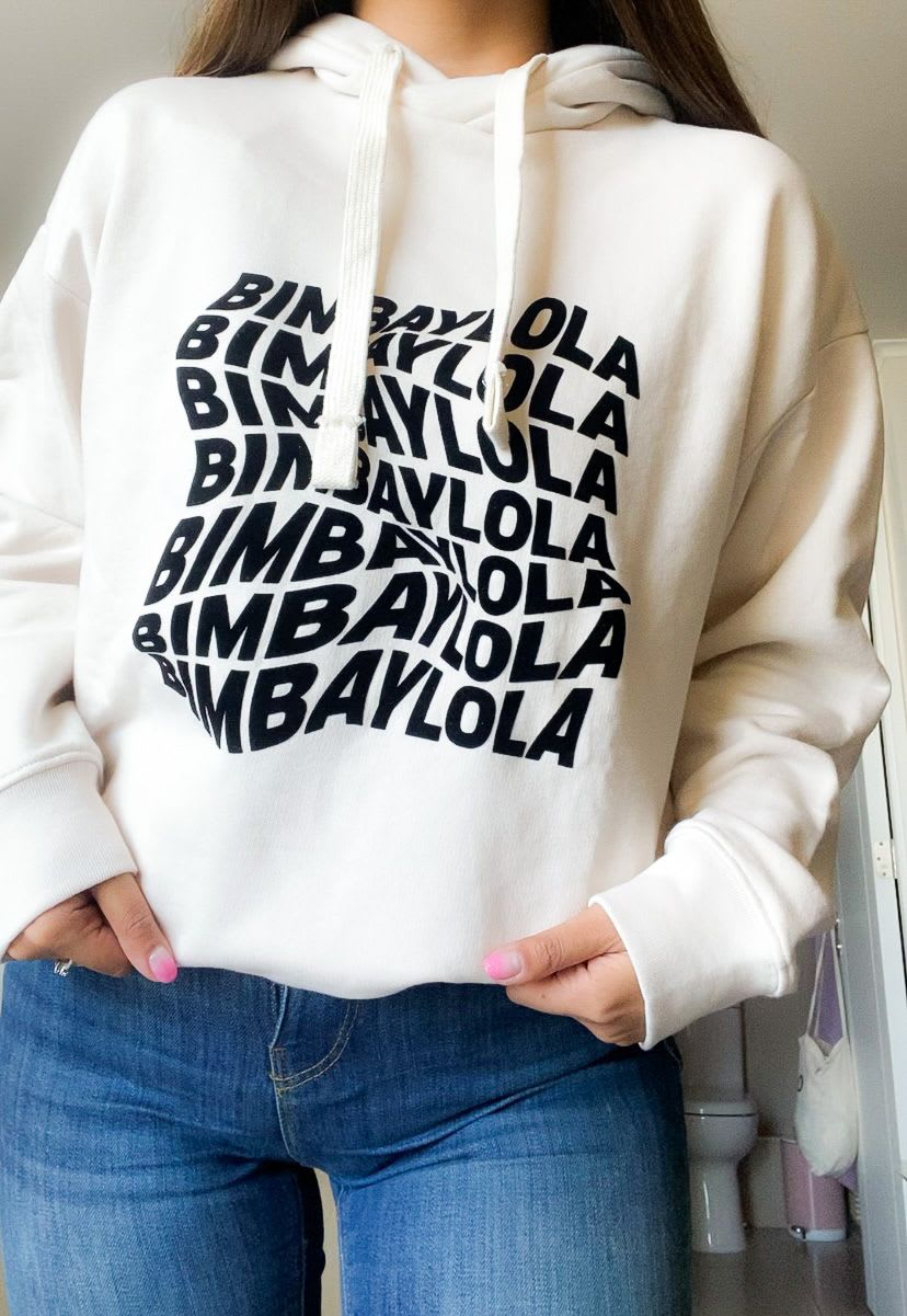 Poleron Bimba y Lola Beige Letras Negras de Tercio Pelo | Befashion