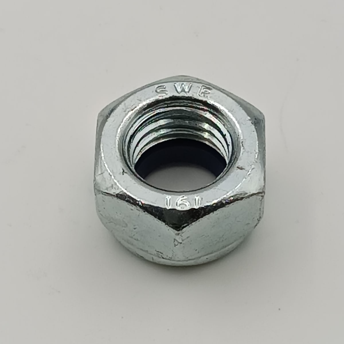 TUERCA DIN 985 CINCADA SEGURO NYLON M24-3.00 | RNK Ferreteria Industrial